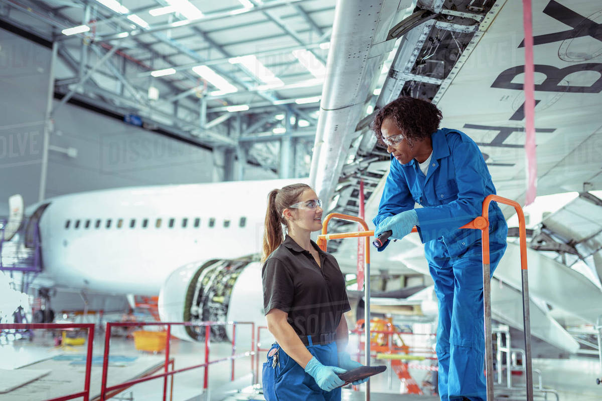 Female apprentice aircraft maintenance engineers in aircraft ...