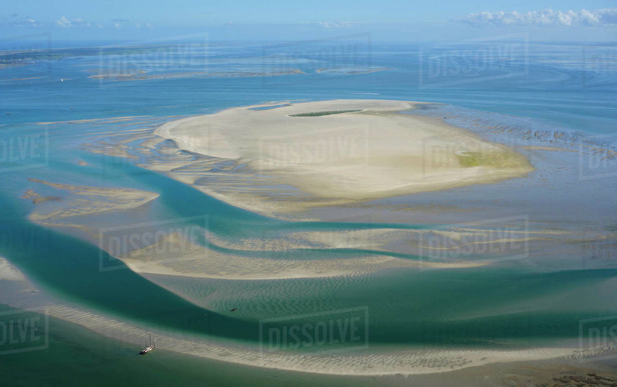 The Netherlands, Friesland, Mudflats and tidal water in Wadden Sea ...
