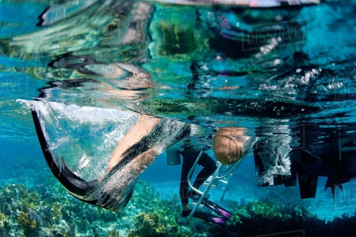 Underwater view of giant stride - Stock Photo - Dissolve