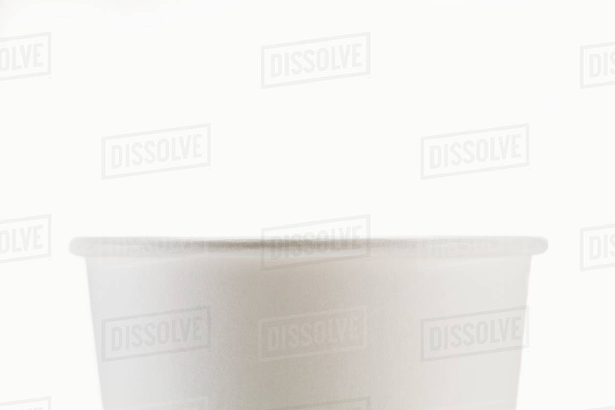 White disposable cup, close up - Stock Photo - Dissolve