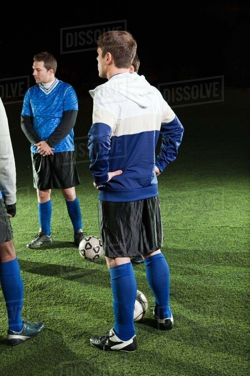 Men in soccer training on pitch - Stock Photo - Dissolve
