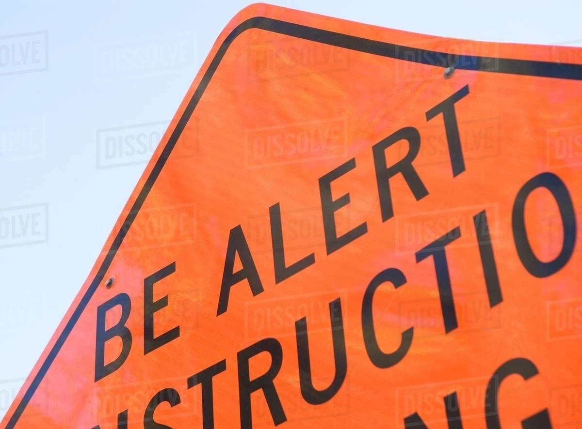 Close up on warning sign - Royalty-free Stock Photo | Dissolve