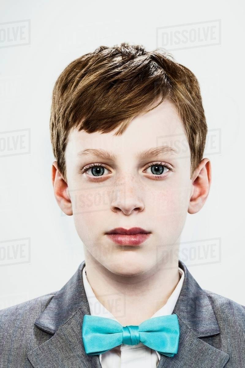 Boy wearing bow tie - Stock Photo - Dissolve