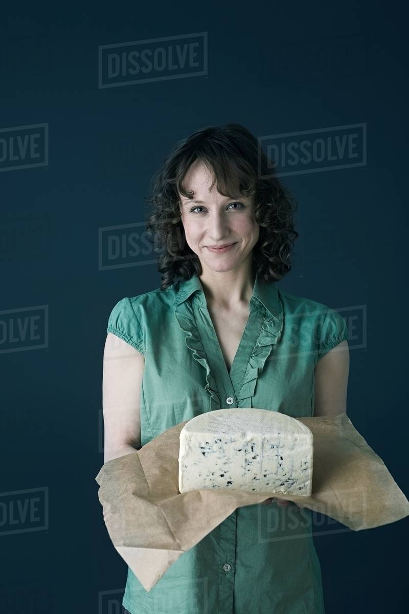Woman with cheese - Stock Photo - Dissolve
