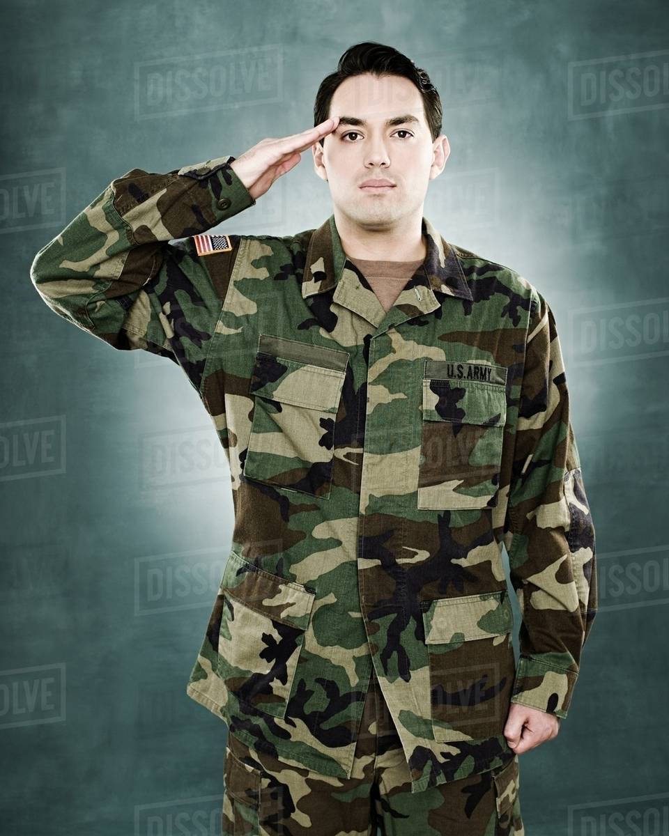 Portrait of a soldier saluting - Stock Photo - Dissolve