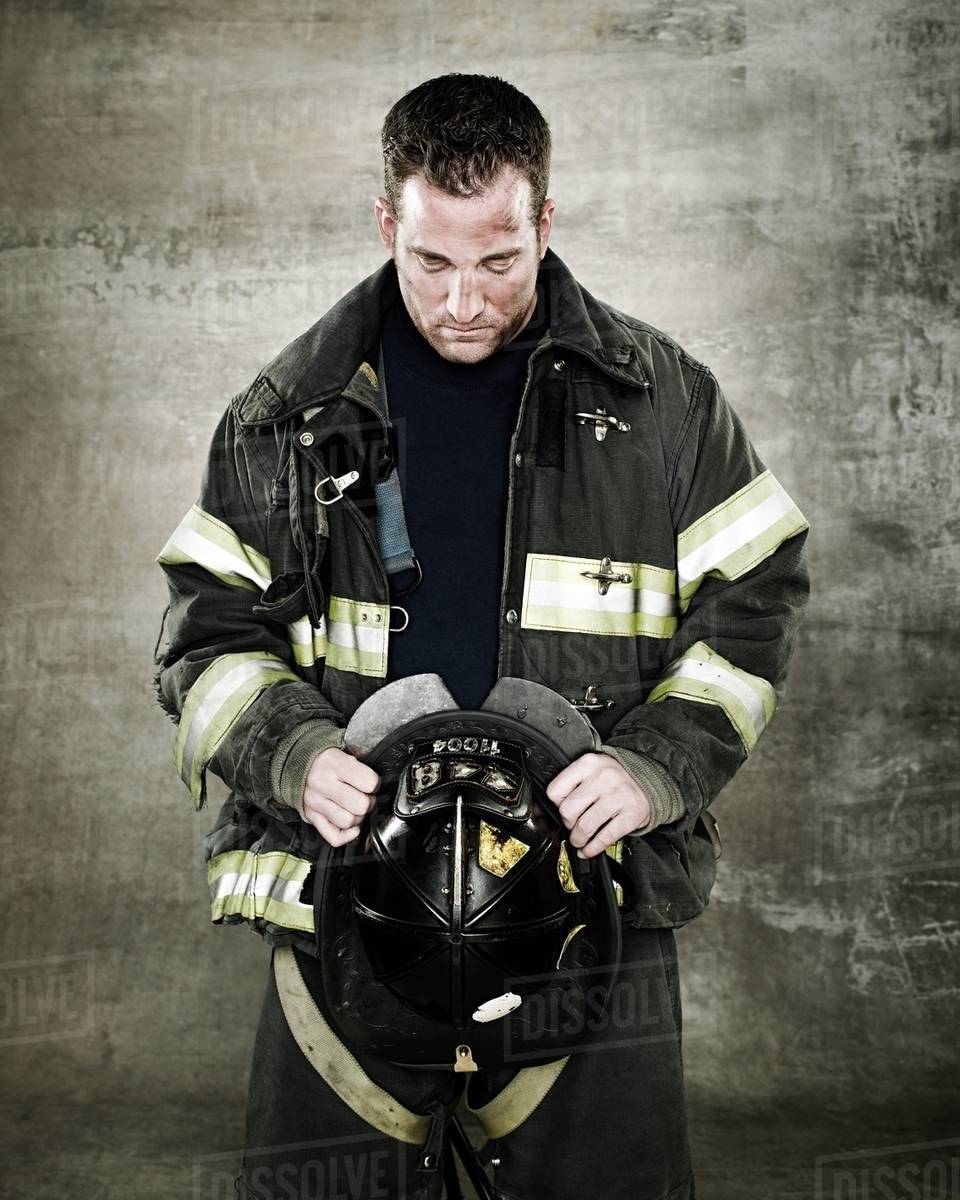 Portrait of a firefighter - Stock Photo - Dissolve