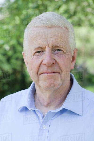 Portrait of senior man outdoors - Stock Photo - Dissolve