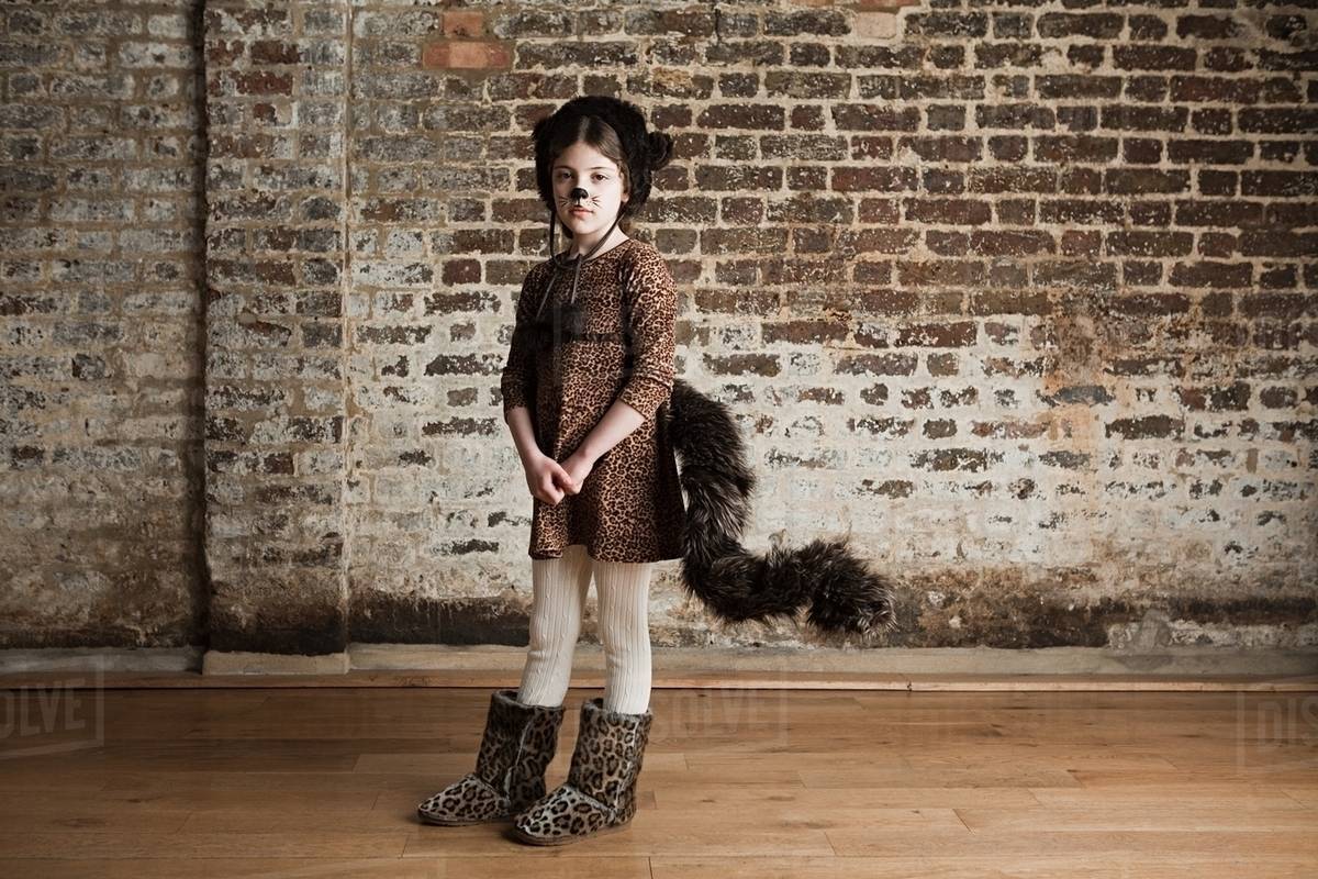 Young girl dressed up as cat - Royalty-free Stock Photo | Dissolve