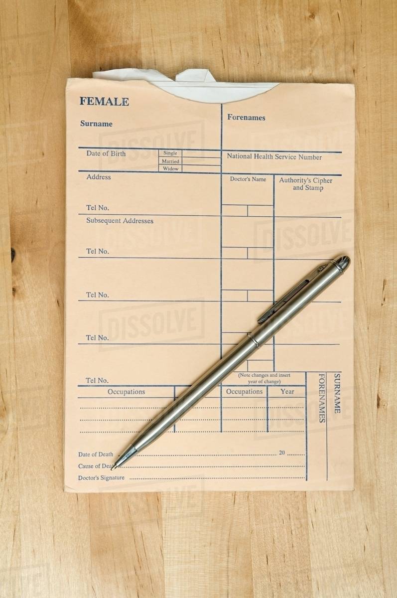 Medical record and pen - Royalty-free Stock Photo | Dissolve