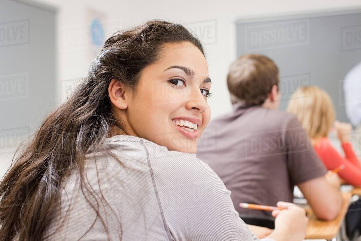 High school student sitting in classroom - Royalty-free Stock Photo ...