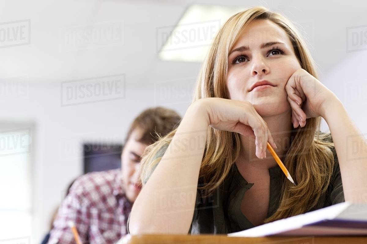 Studious female high school student - Royalty-free Stock Photo | Dissolve