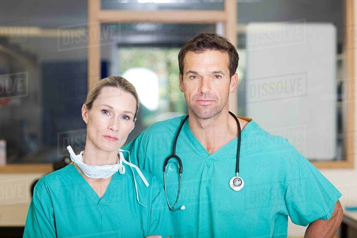 Two surgeons looking serious - Stock Photo - Dissolve