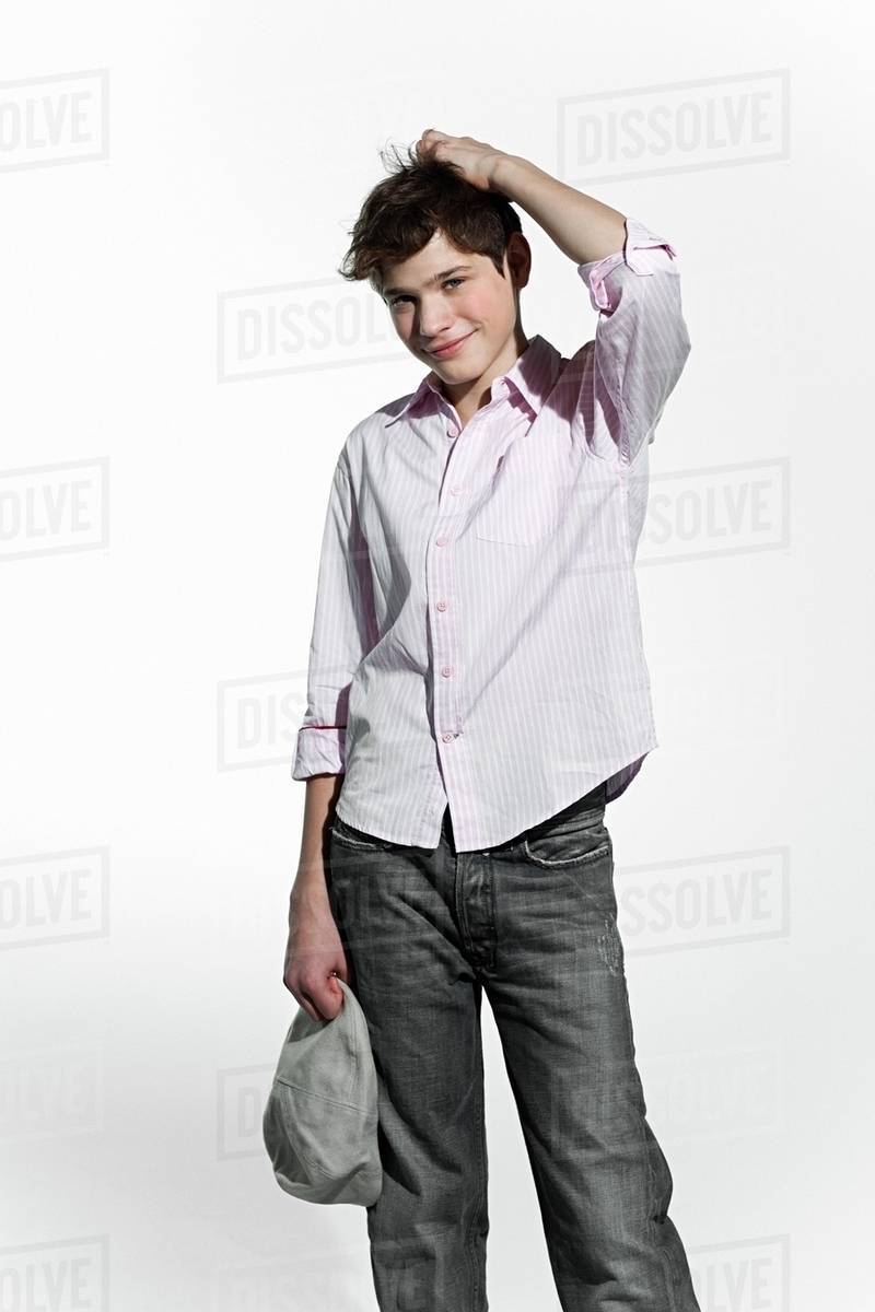 Boy scratching his head - Royalty-free Stock Photo | Dissolve