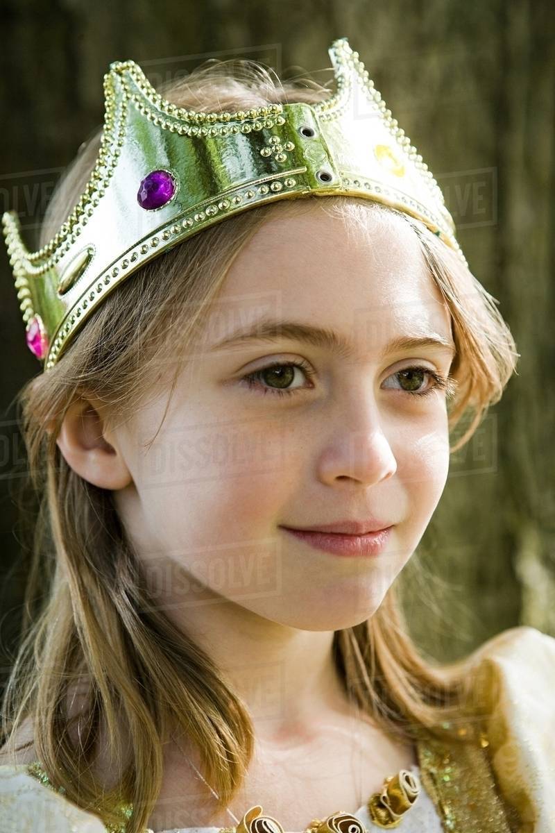 Girl wearing crown dressed up as queen - Royalty-free Stock Photo ...