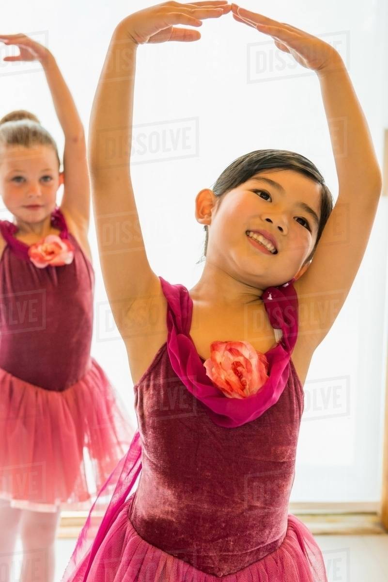 Ballerinas practising together, smiling - Royalty-free Stock Photo ...