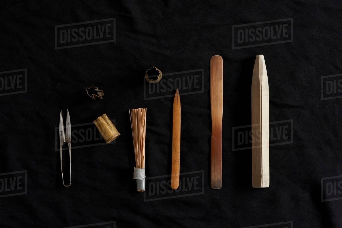 Traditional Japanese tools on black background - Stock Photo - Dissolve