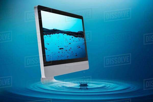 Still life with computer submerging in water - Royalty-free Stock Photo ...