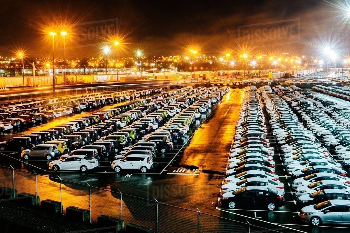 New cars in lot - Stock Photo - Dissolve