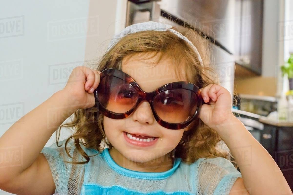 Portrait of young girl, wearing sunglasses - Royalty-free Stock Photo ...