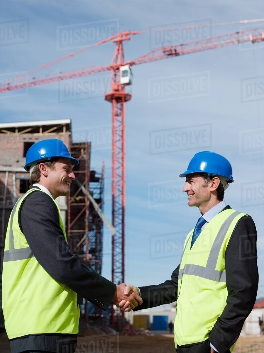 Engineers shaking hands - Royalty-free Stock Photo | Dissolve