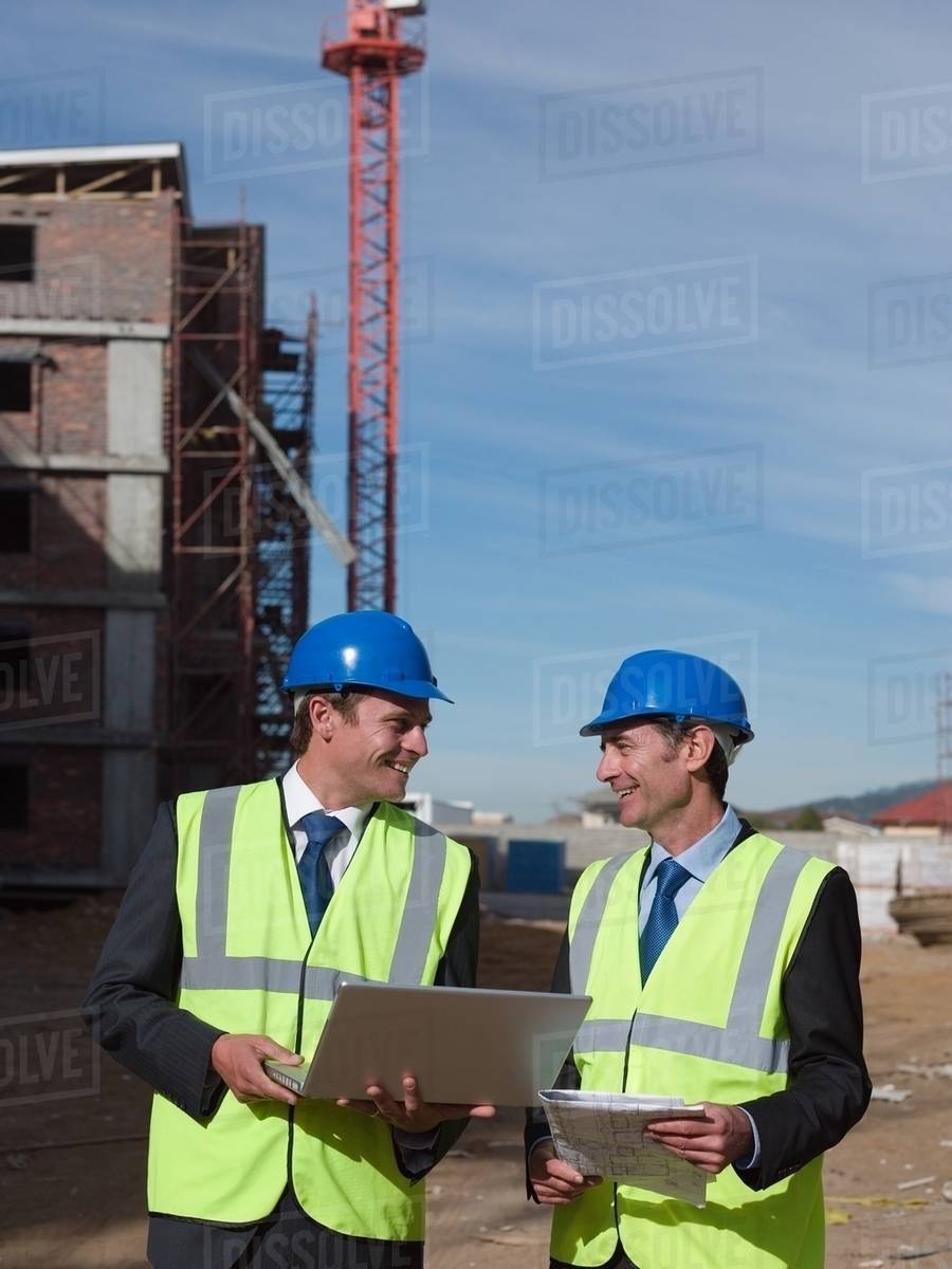 Engineers on building site - Stock Photo - Dissolve
