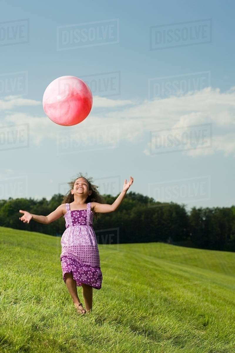Girl with a ball - Royalty-free Stock Photo | Dissolve