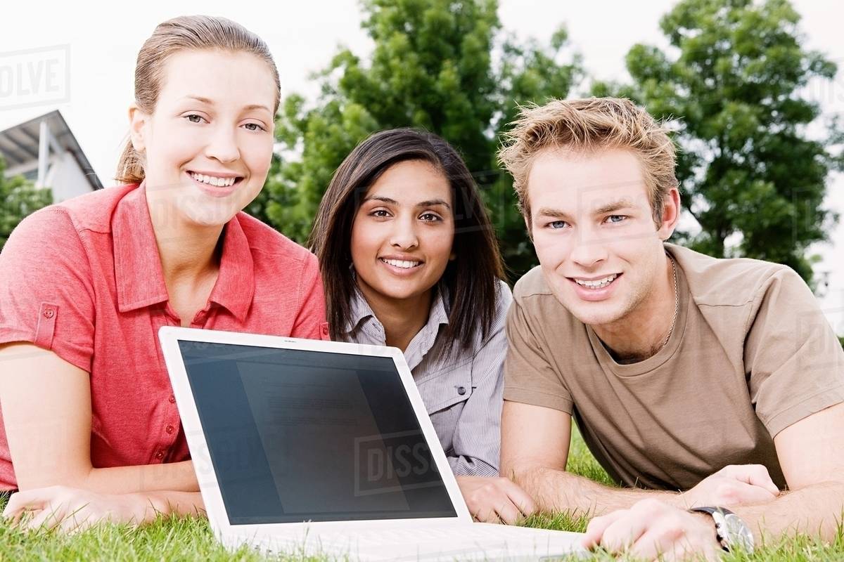 Students working outdoors - Stock Photo - Dissolve
