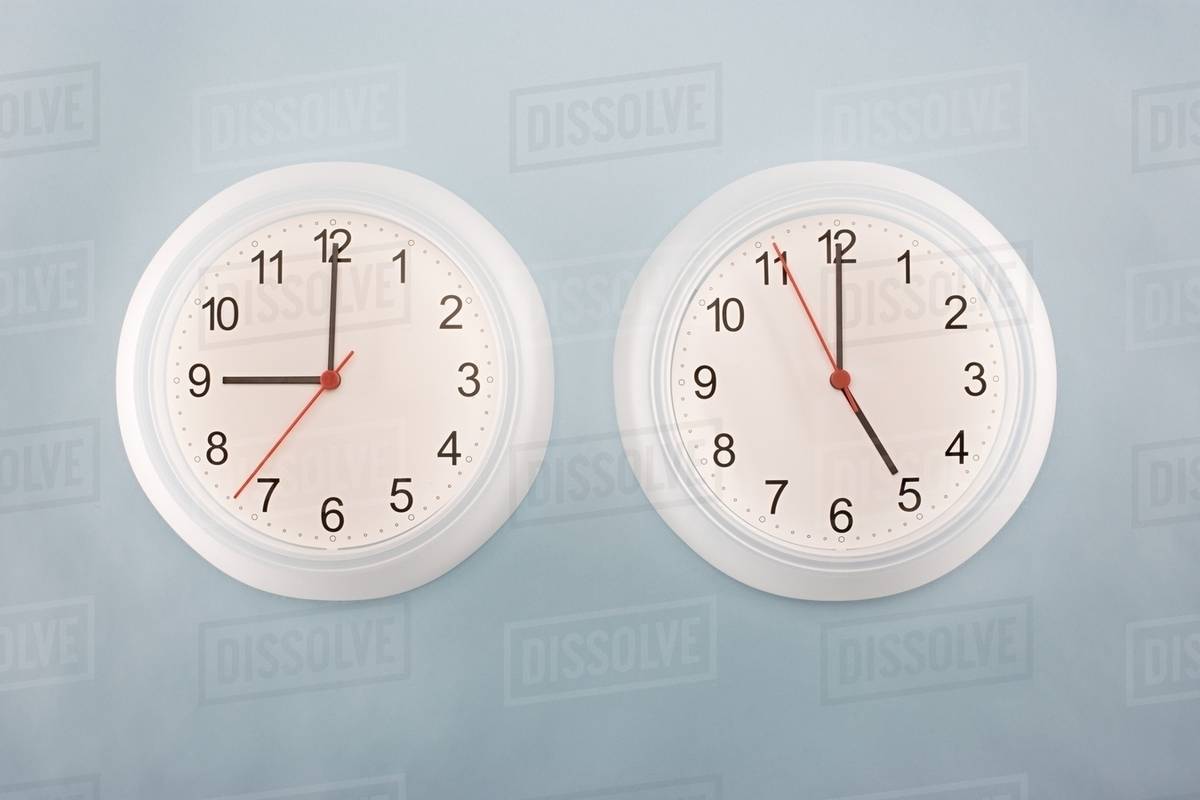 Two clocks - Stock Photo - Dissolve