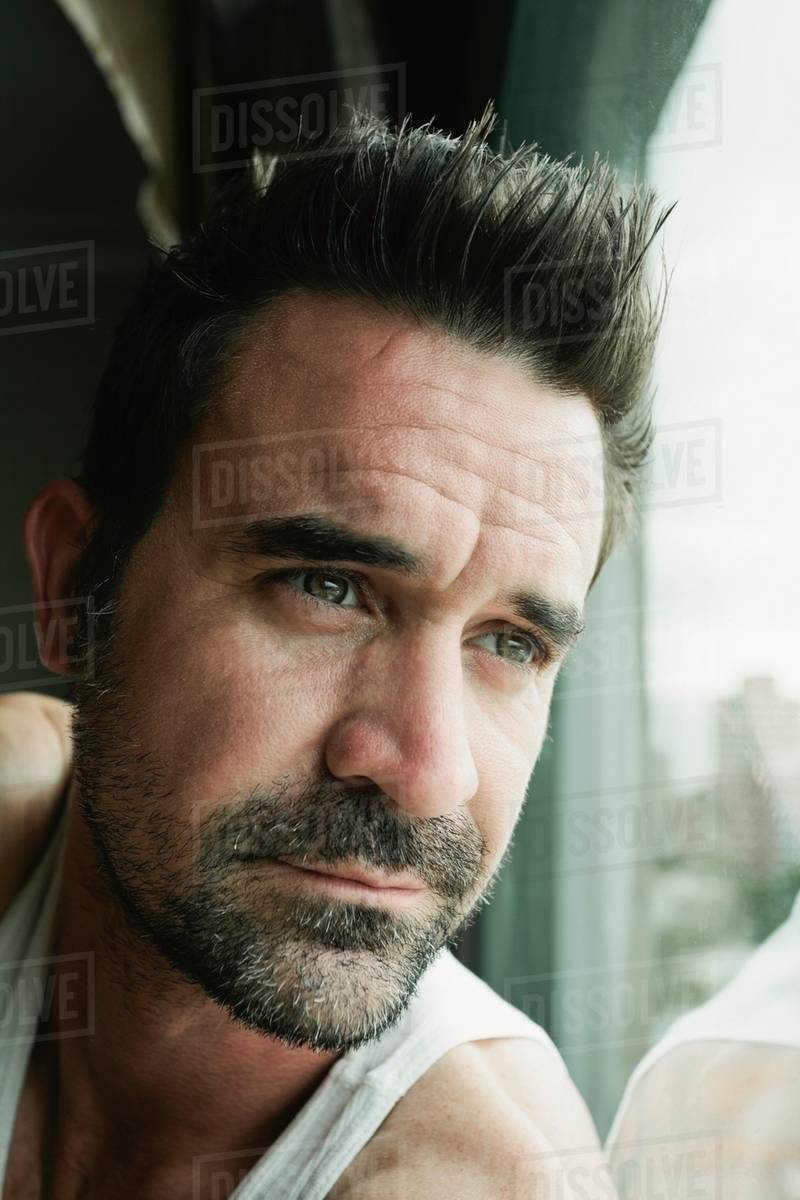 Close up of man's serious face - Royalty-free Stock Photo | Dissolve