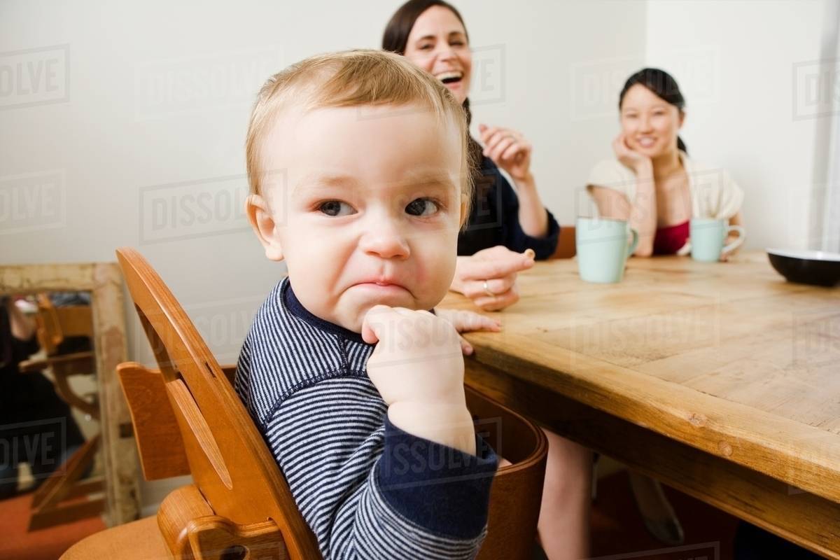 A baby boy pulling a face - Royalty-free Stock Photo | Dissolve