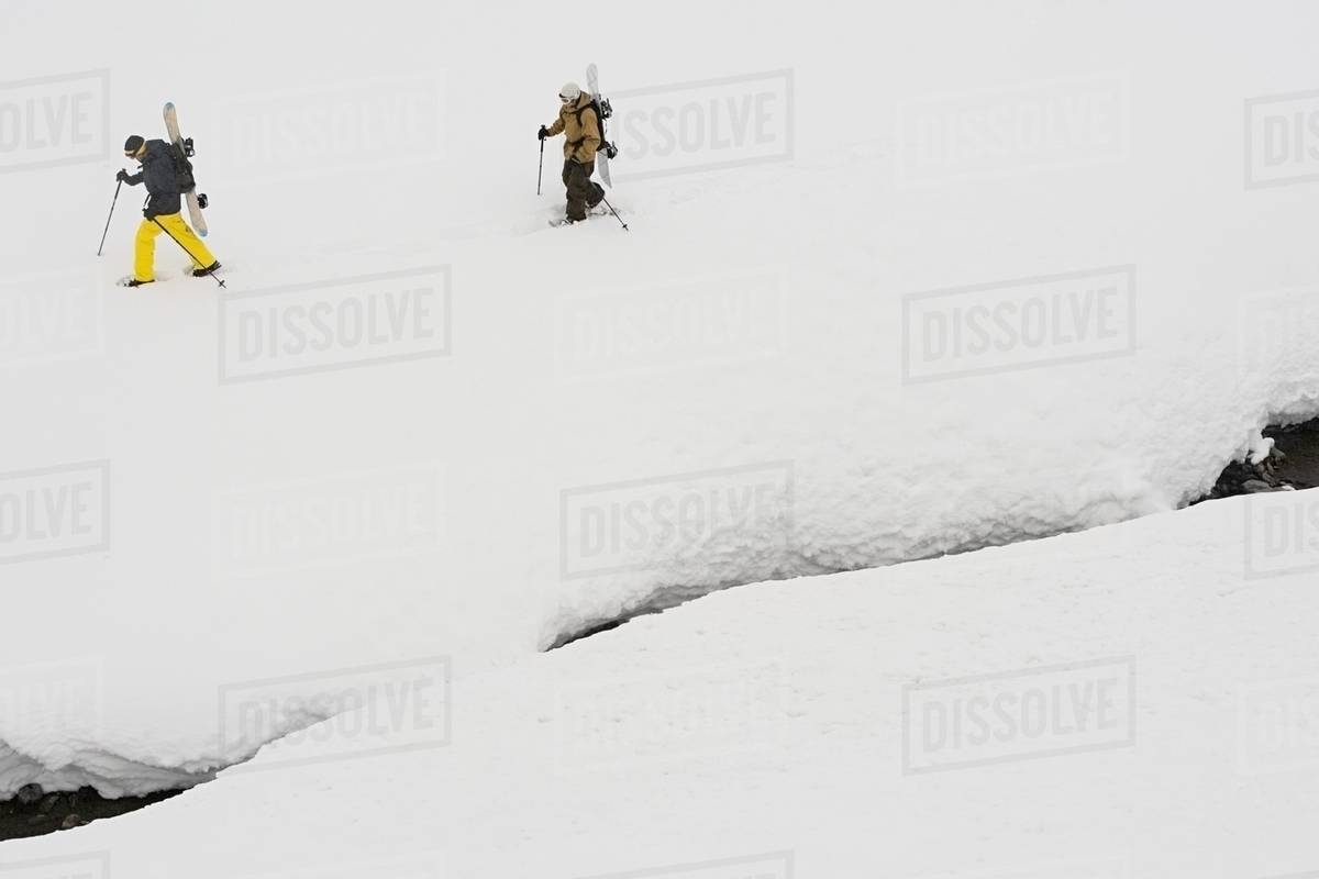 Two men skiing - Royalty-free Stock Photo | Dissolve