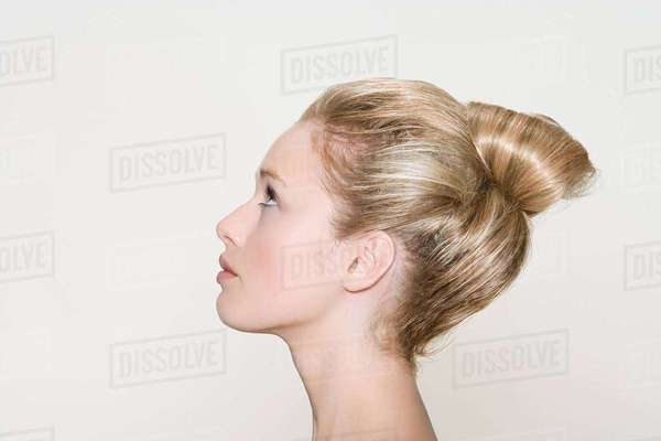 Profile of a woman with a hairstyle - Royalty-free Stock Photo | Dissolve