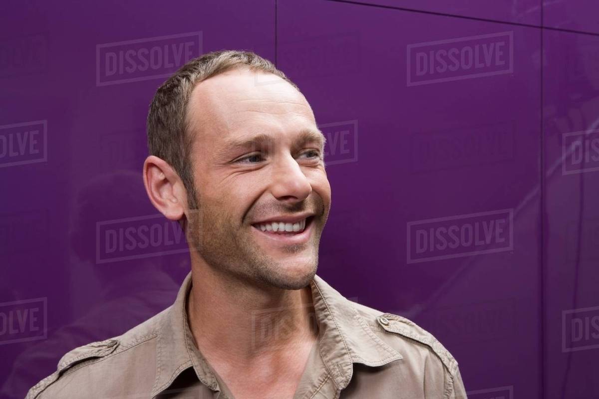 Head and shoulders of a smiling man - Royalty-free Stock Photo | Dissolve