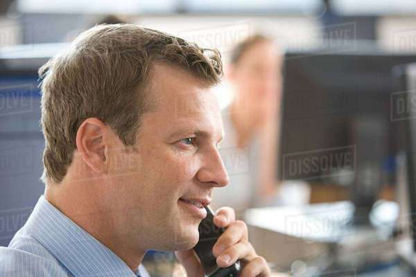 Businessman using a telephone - Royalty-free Stock Photo | Dissolve