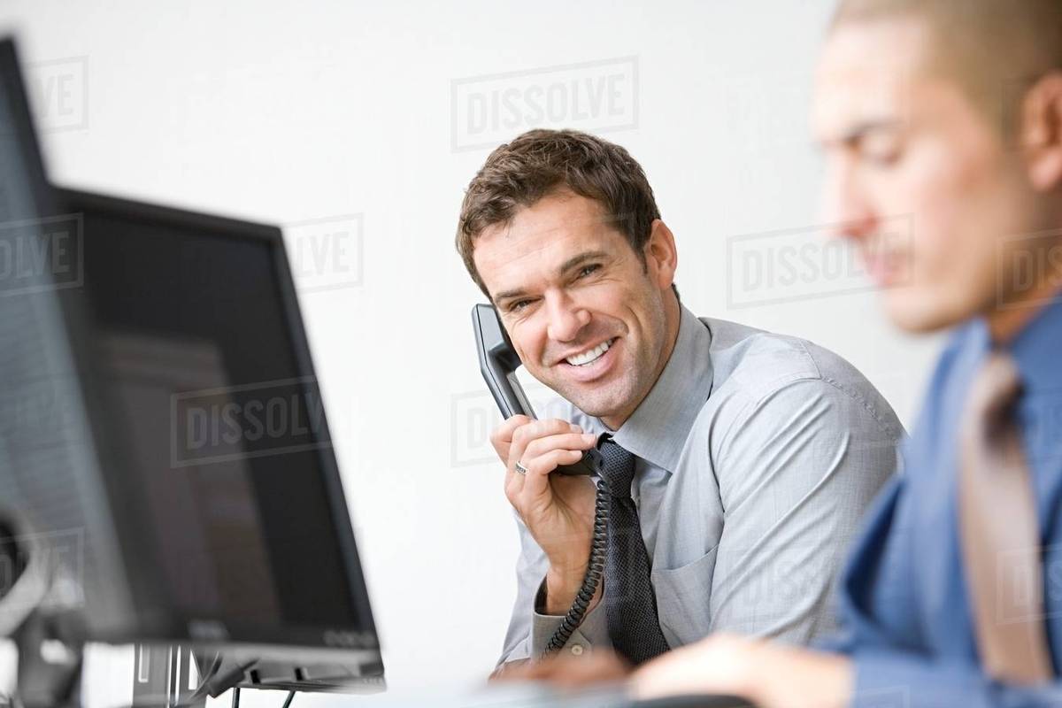 Businessman using a telephone - Royalty-free Stock Photo | Dissolve