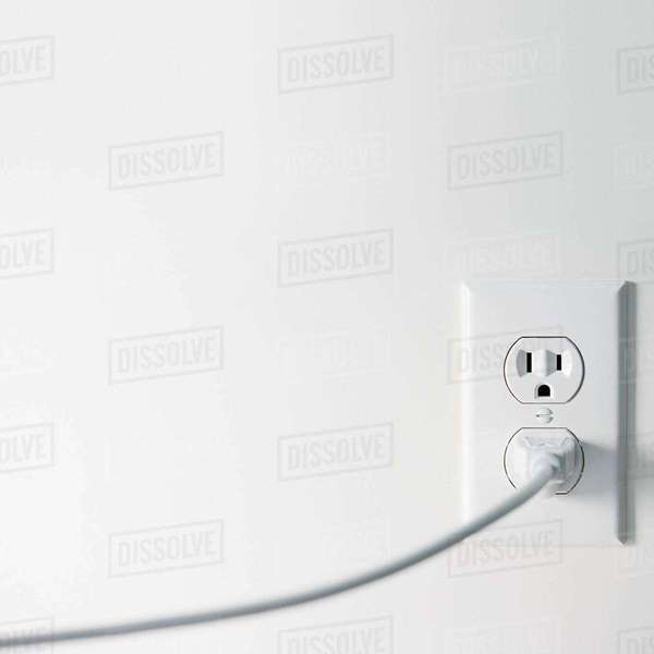Electric plug and electrical sockets - Stock Photo - Dissolve
