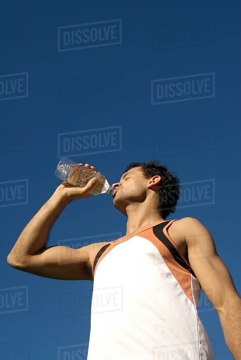 A man drinking water - Royalty-free Stock Photo | Dissolve