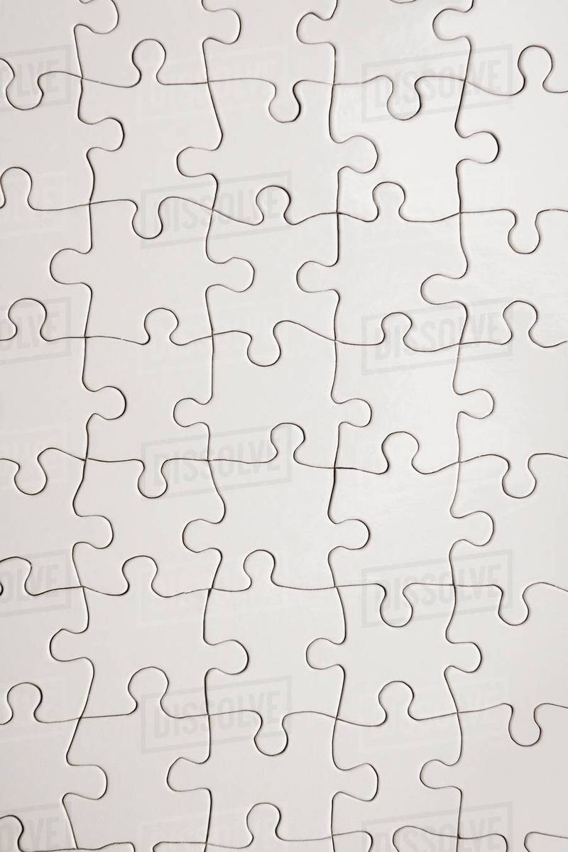 Complete jigsaw puzzle - Stock Photo - Dissolve