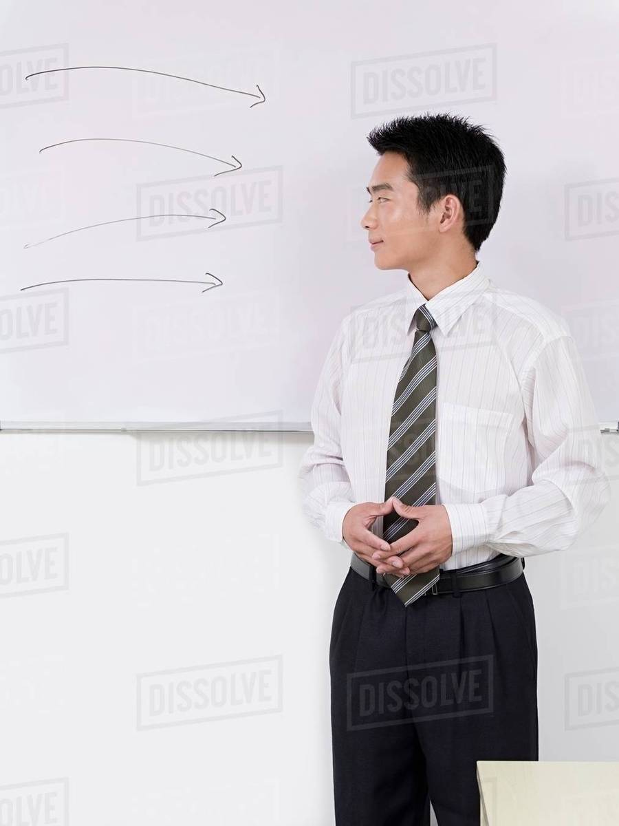 Man giving presentation - Stock Photo - Dissolve
