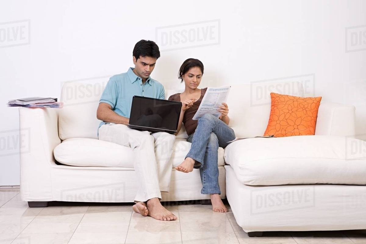 A couple sorting out finances - Stock Photo - Dissolve