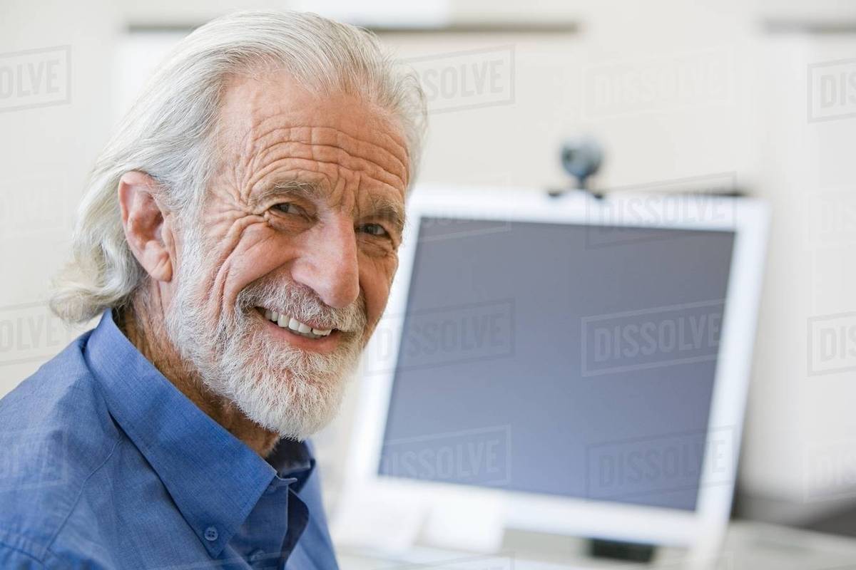 Senior man and computer - Royalty-free Stock Photo | Dissolve