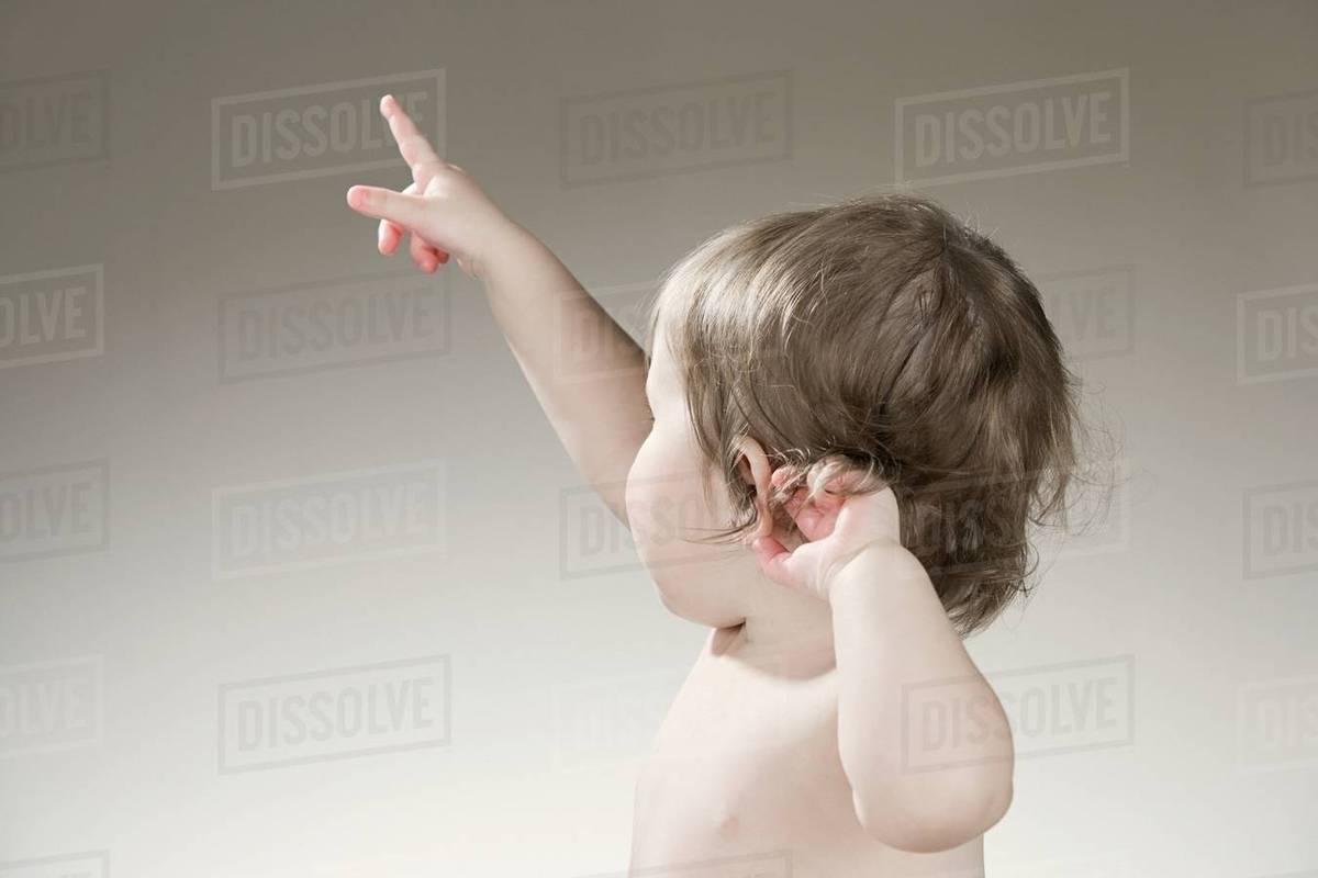 A baby girl pointing - Royalty-free Stock Photo | Dissolve