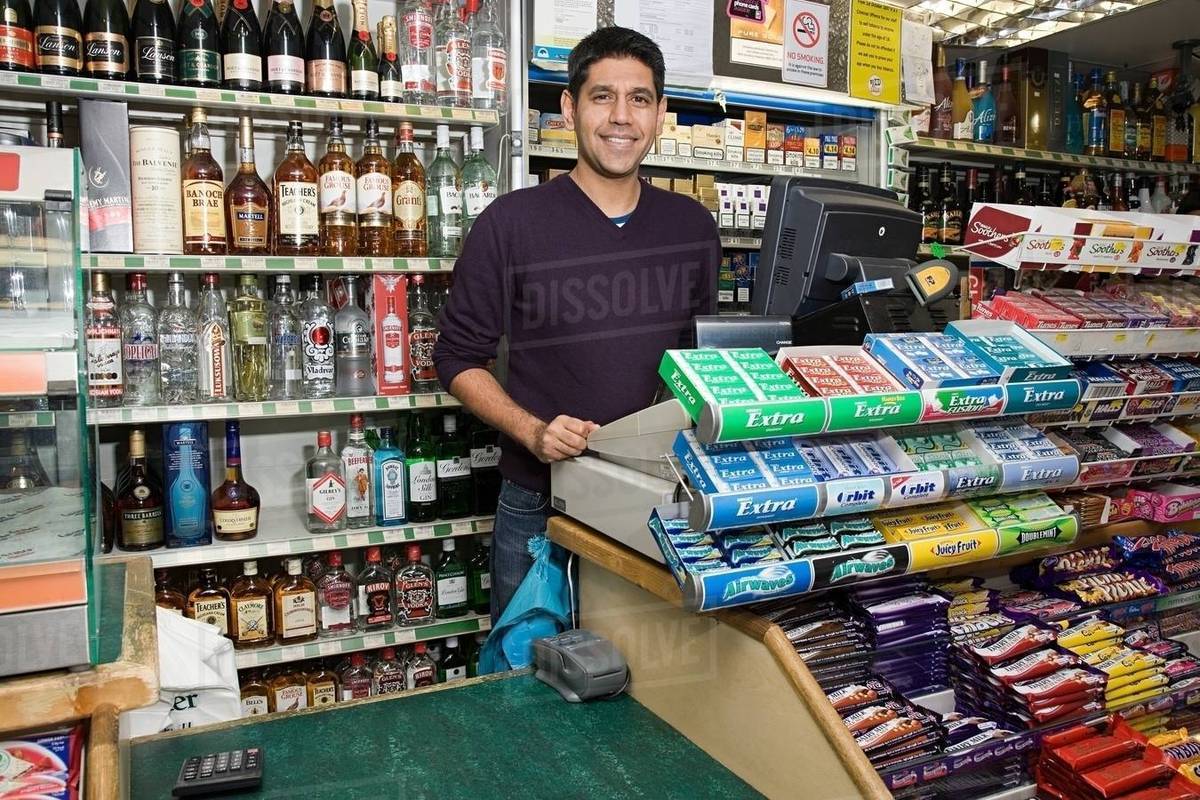 Man in shop - Royalty-free Stock Photo | Dissolve