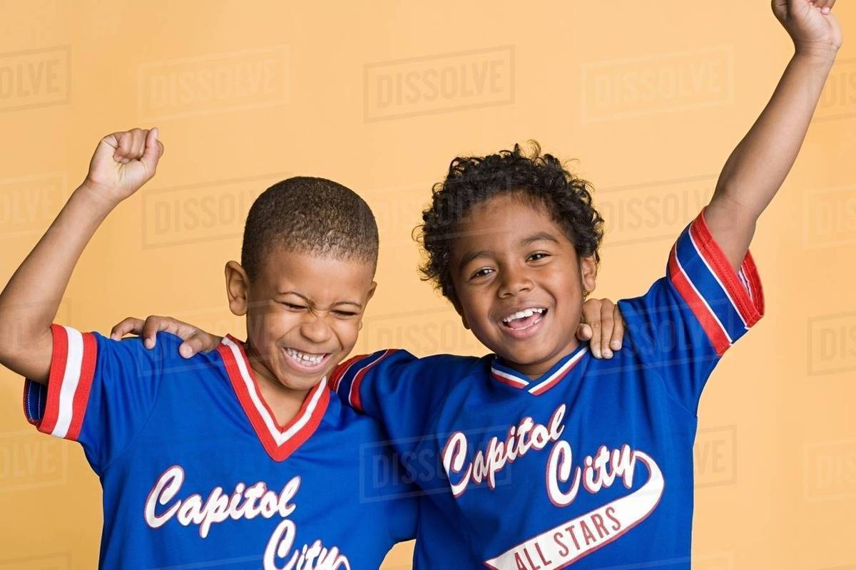 Boys cheering - Royalty-free Stock Photo | Dissolve