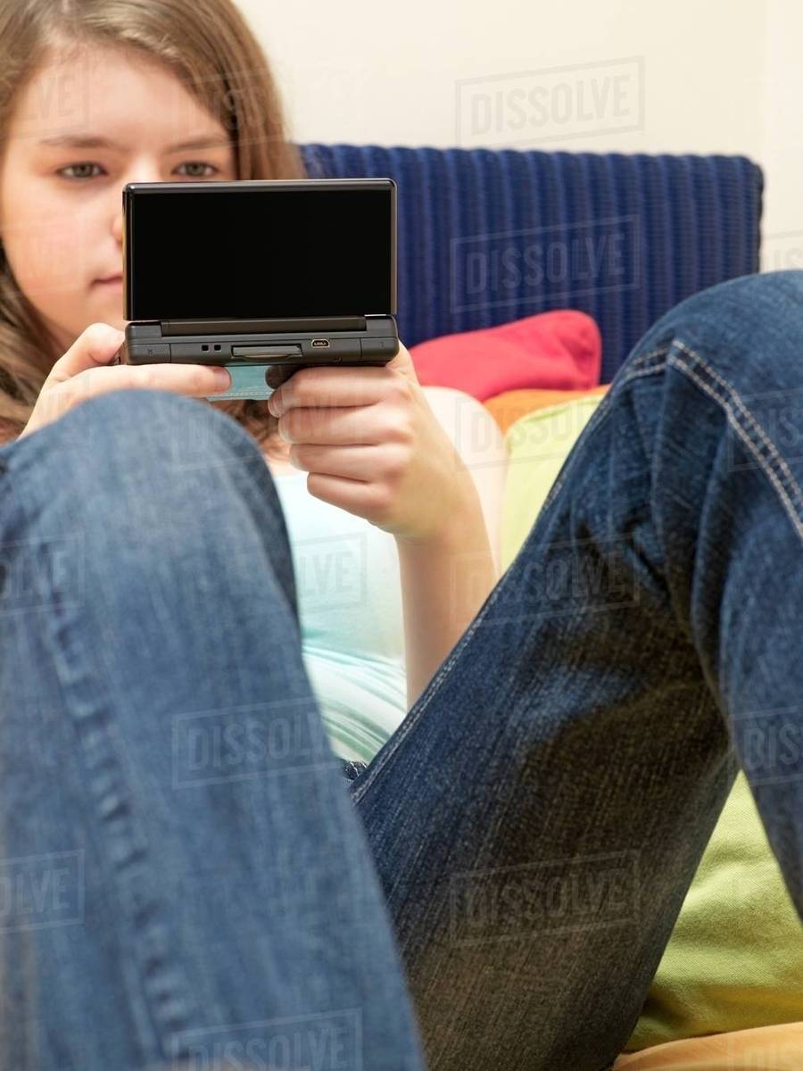 Girl playing computer game - Royalty-free Stock Photo | Dissolve