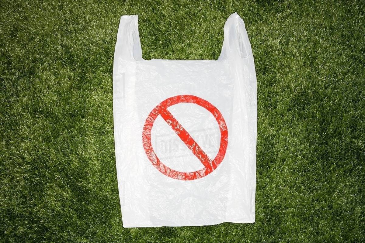 A plastic bag with a warning sign on it - Royalty-free Stock Photo ...