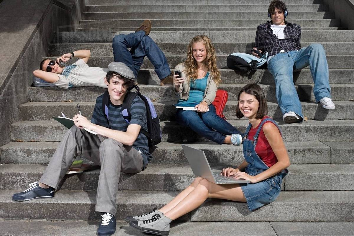 High school students sitting on steps - Royalty-free Stock Photo | Dissolve