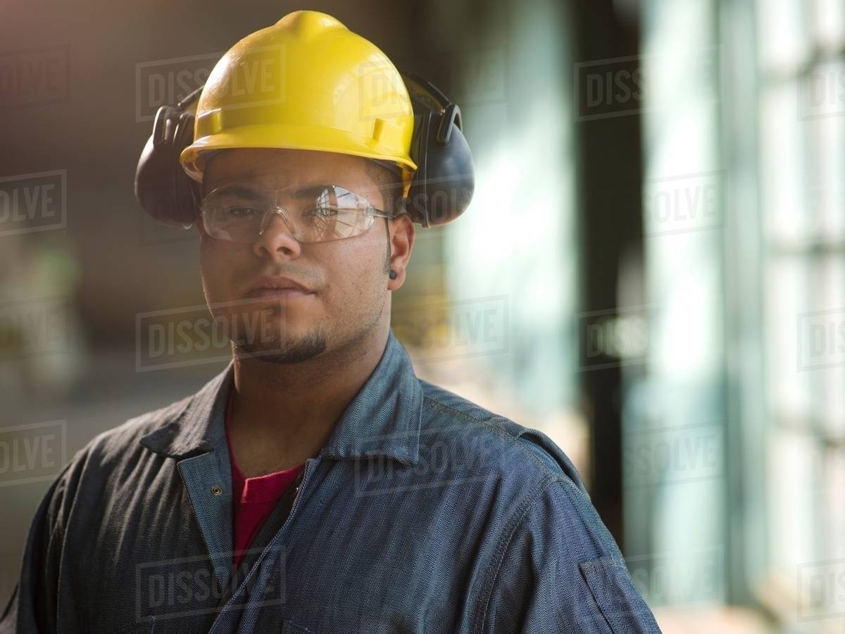 Engineer wearing hard hat on site - Stock Photo - Dissolve