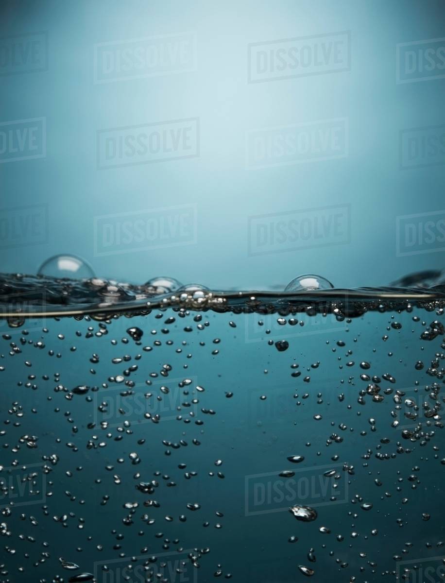 Bubbles floating in water - Stock Photo - Dissolve