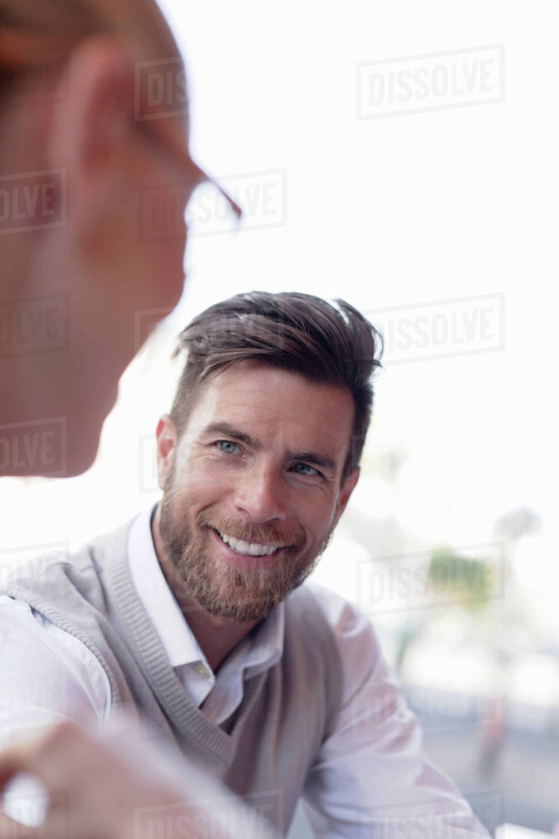 Mature man and woman, face to face, smiling - Royalty-free Stock Photo ...